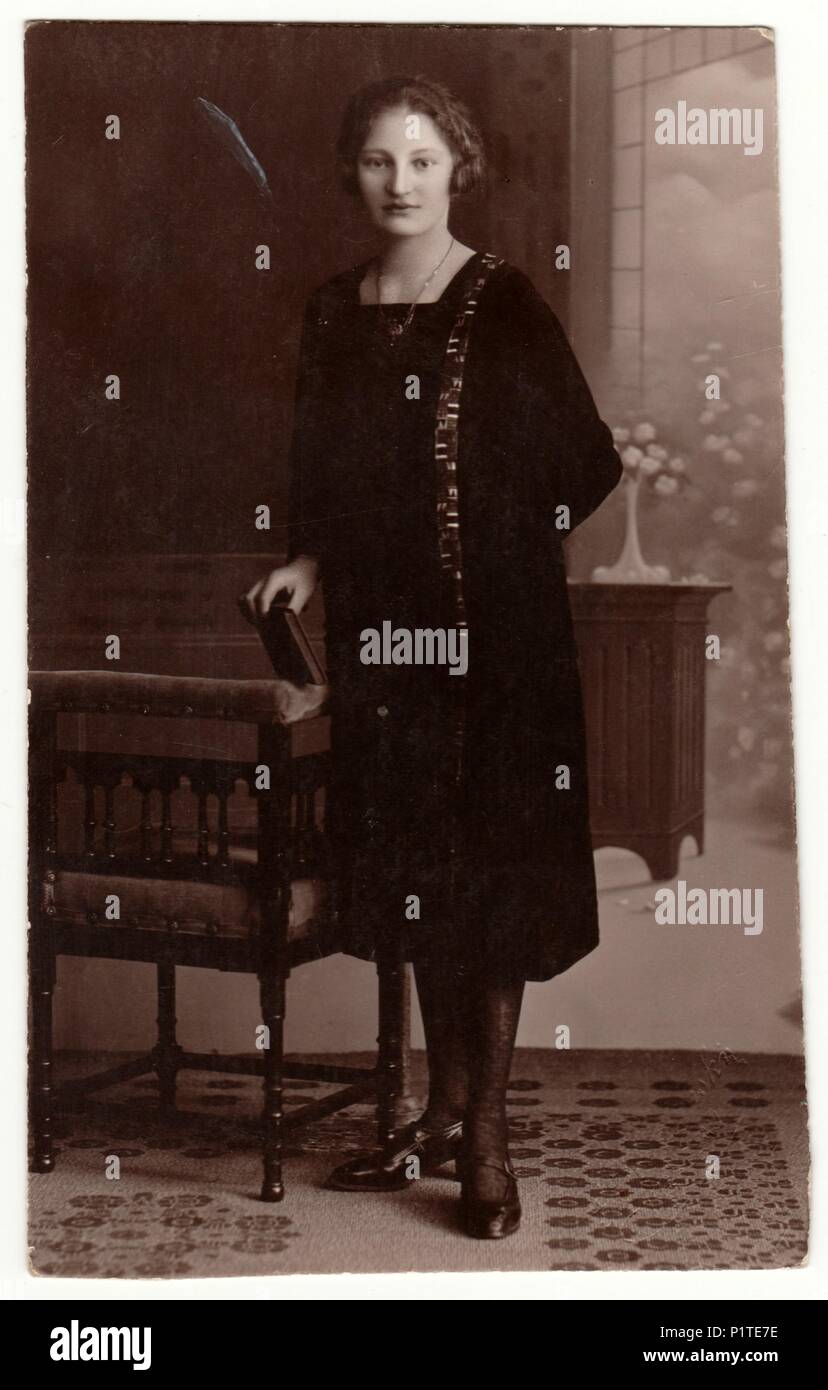 GERMANY - CIRCA 1930s: Vintage photo shows woman in a photography ...