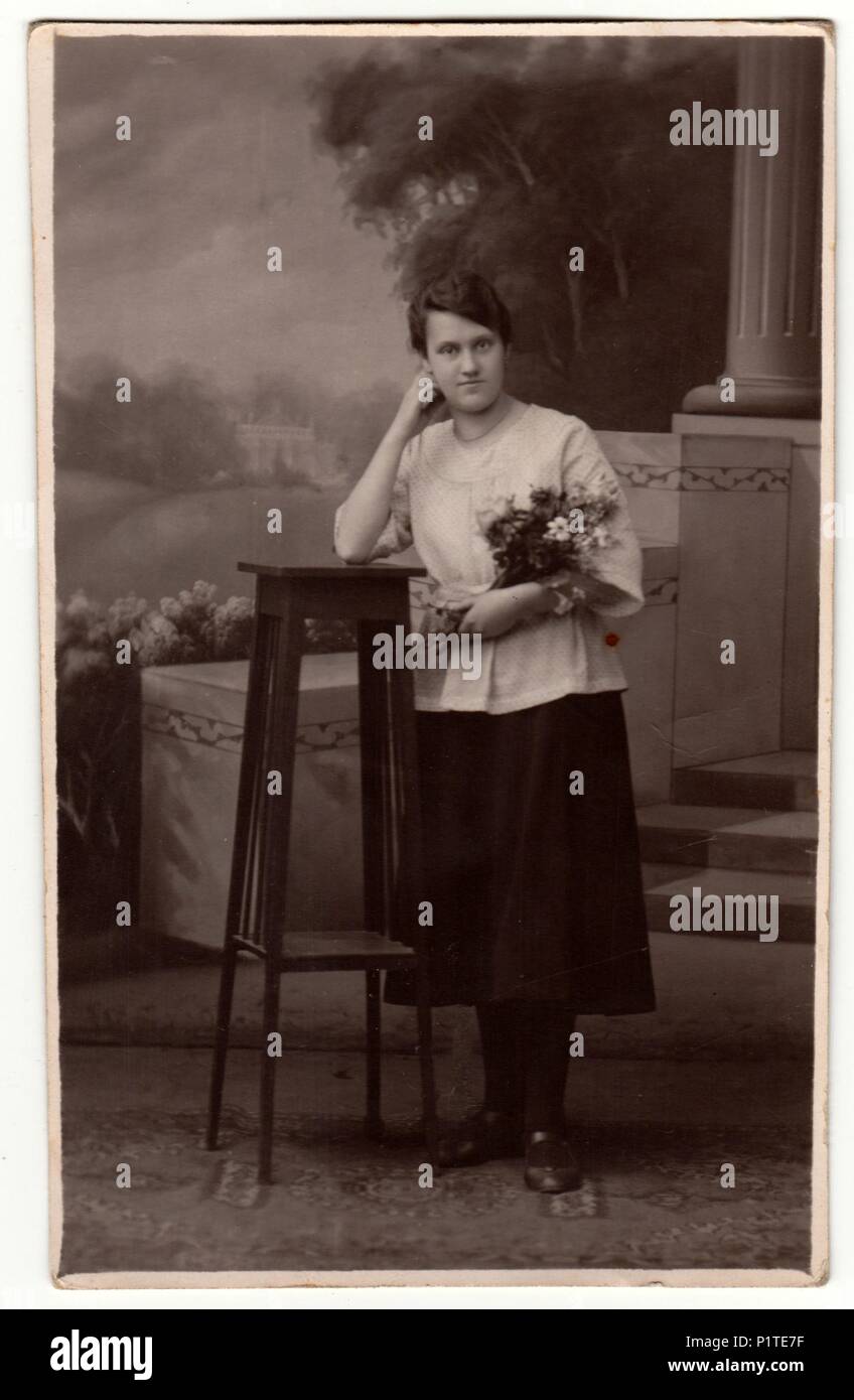 GERMANY - CIRCA 1930s: Vintage photo shows woman in a photography ...