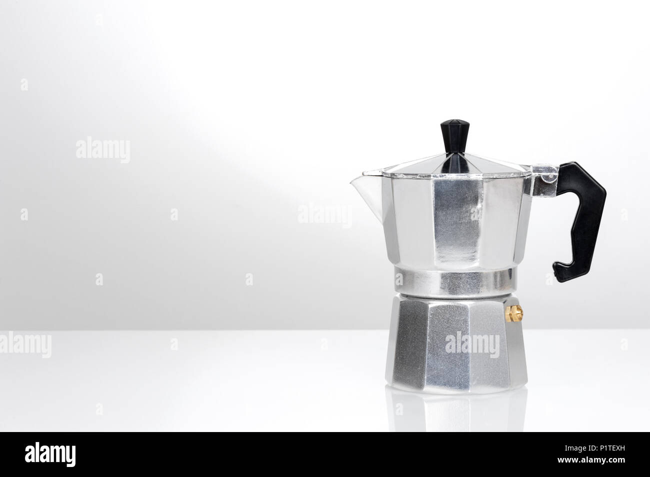 italian style coffee pot or moka pot isolated over white background ...