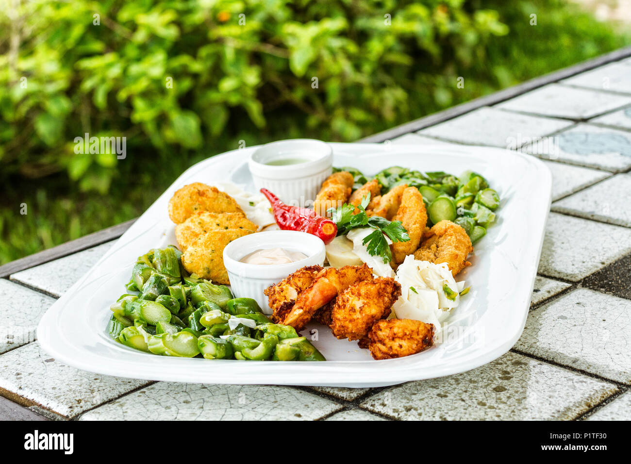 Deep fried fish snacks hi-res stock photography and images - Alamy