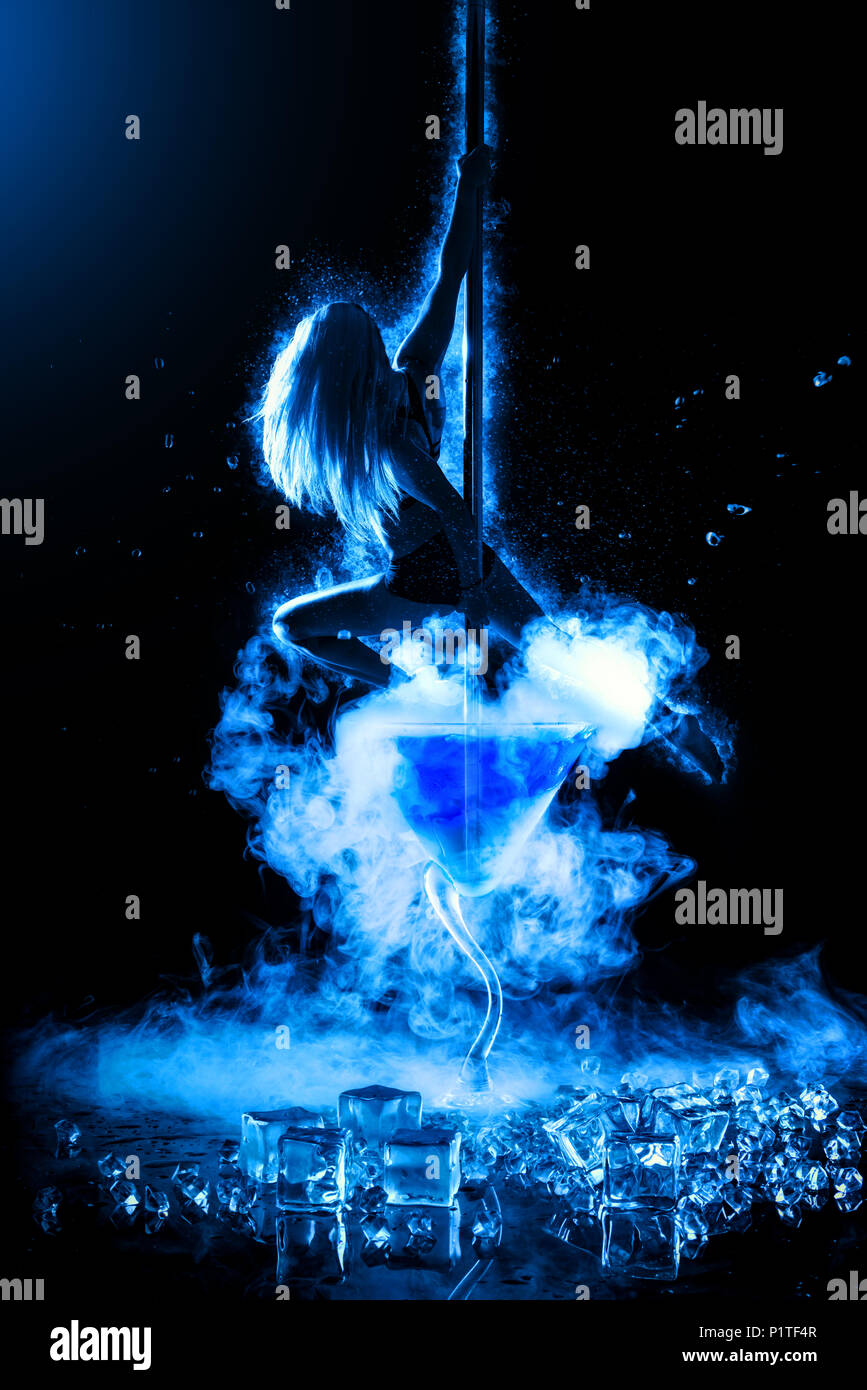 Dancer into smoking martinin glass Stock Photo - Alamy
