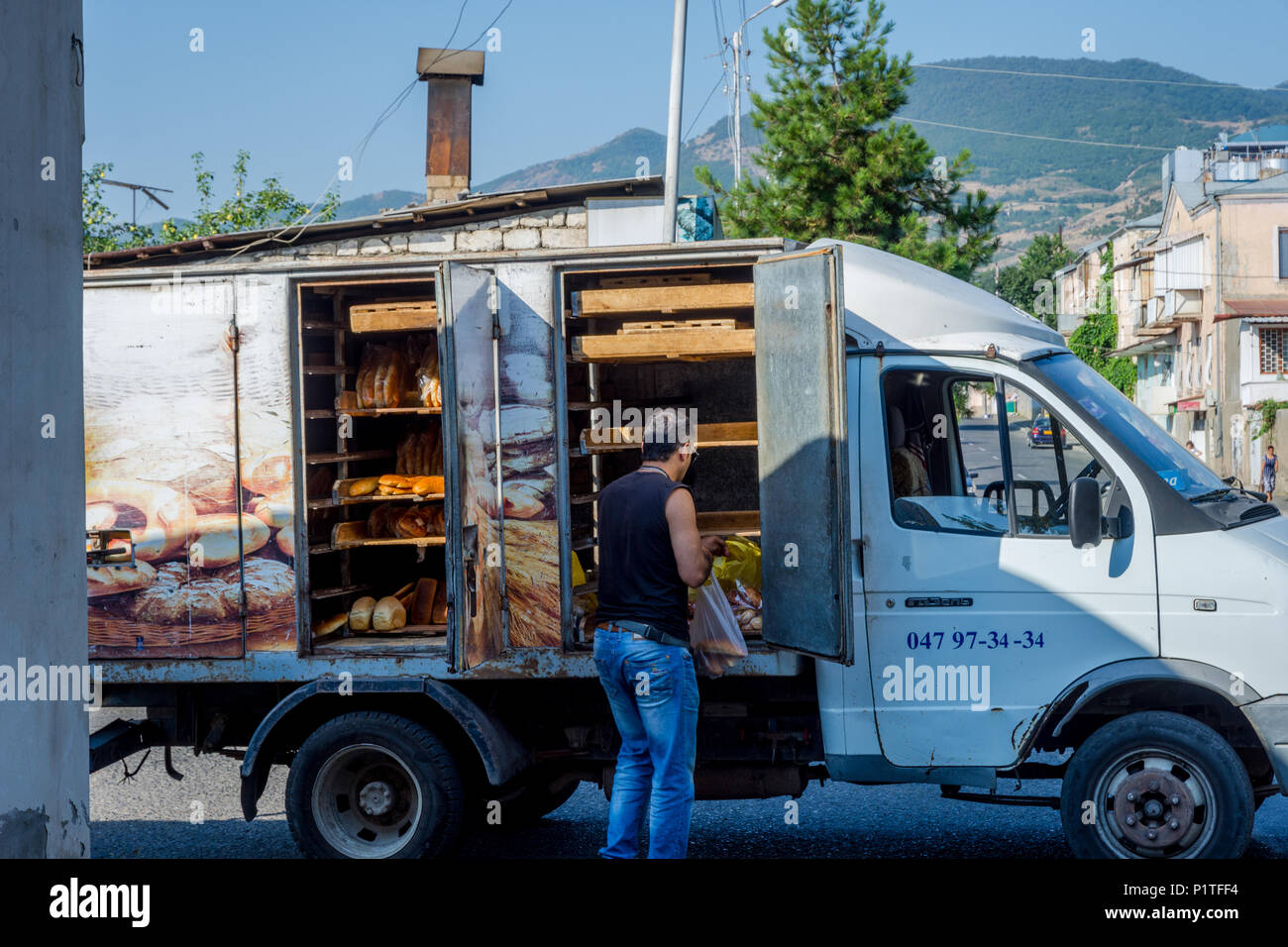 Man delivering bread by van, Stepanakert, Artsakh republic (Nagorno ...