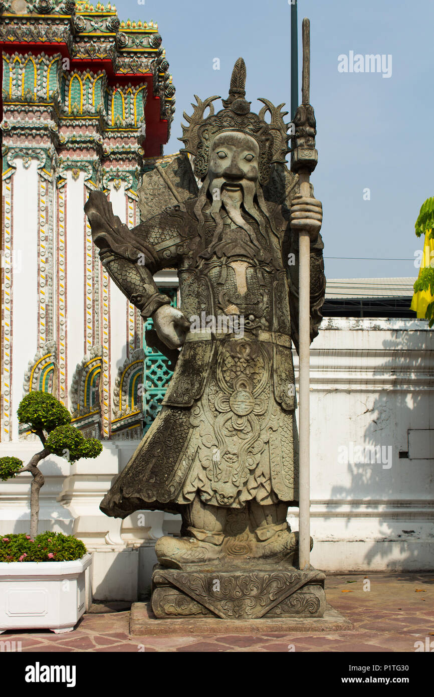 Bangkok, Thailand - January 2014: Chinese guardian stone statue in Wat ...