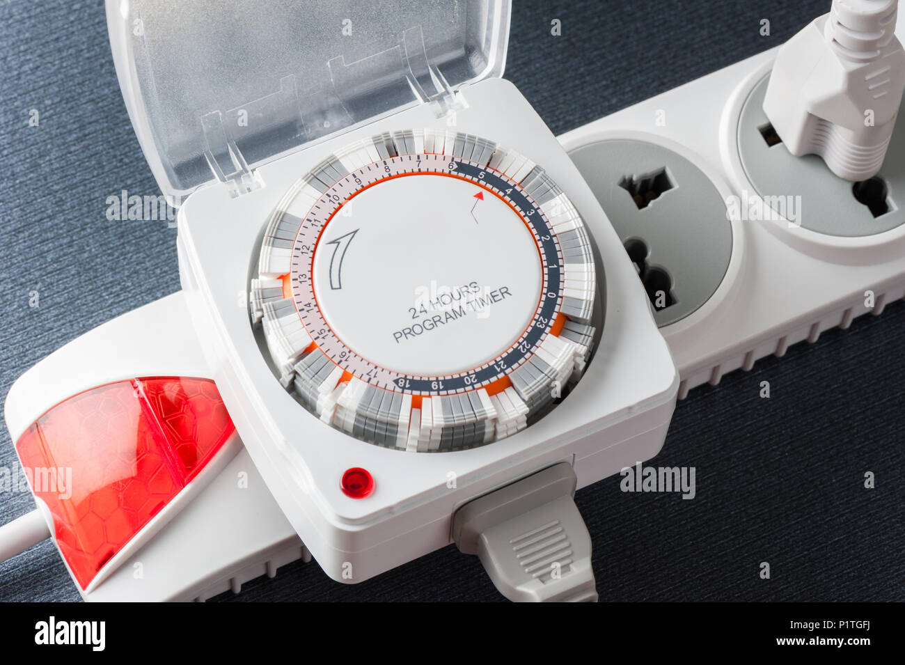 electrical socket with 24 hours program timer Stock Photo - Alamy