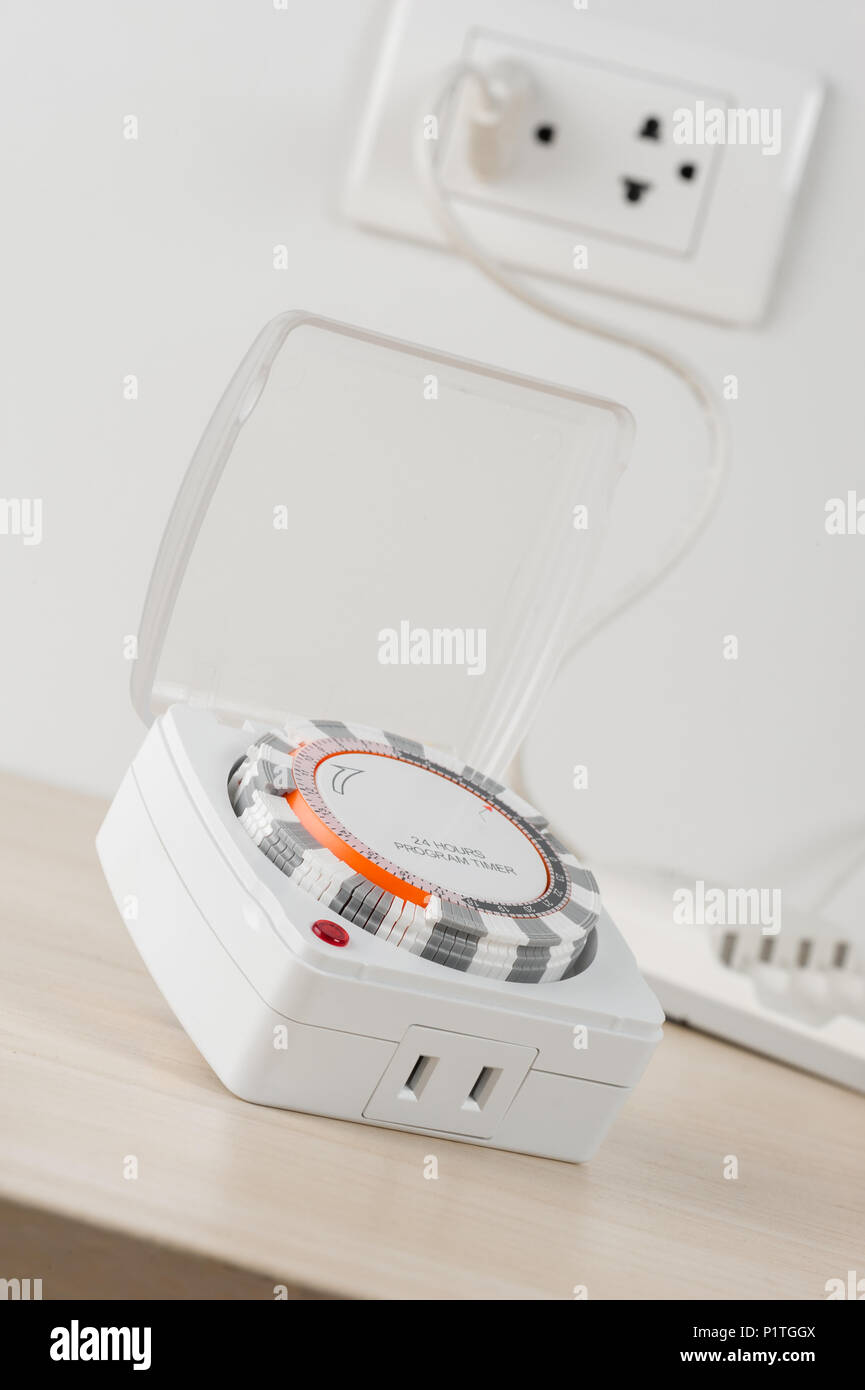 electrical socket with 24 hours program timer Stock Photo - Alamy