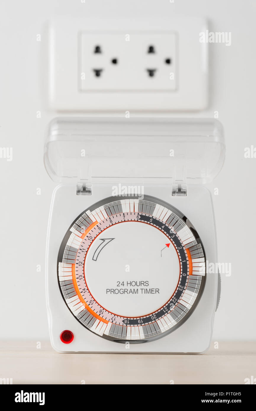 electrical socket with 24 hours program timer Stock Photo - Alamy