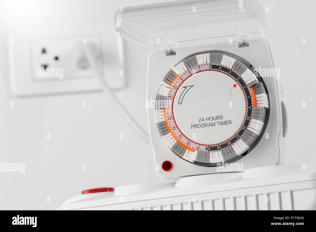 electrical socket with 24 hours program timer Stock Photo - Alamy