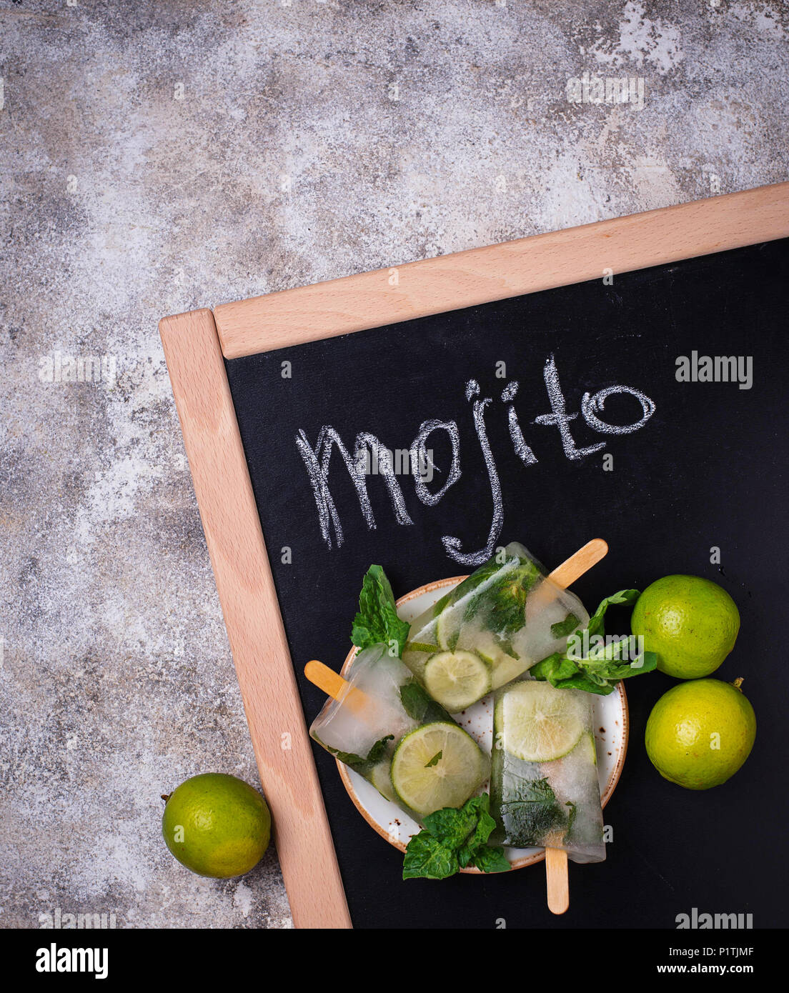 Mojito cocktail popsicle with mint, lime and rum Stock Photo - Alamy