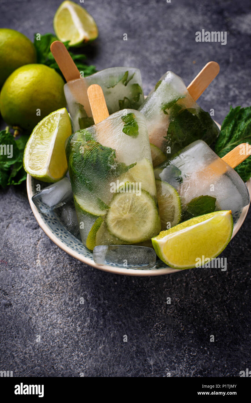 Mojito cocktail popsicle with mint, lime and rum Stock Photo - Alamy