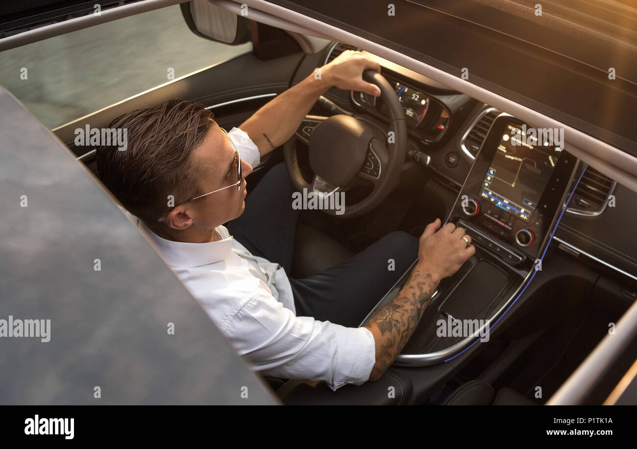Man a driving car hi-res stock photography and images - Alamy