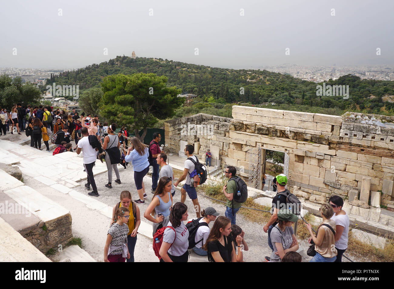 Athens, Greece - April 16, 2018: Tourists crowd the propyla (entrance ...