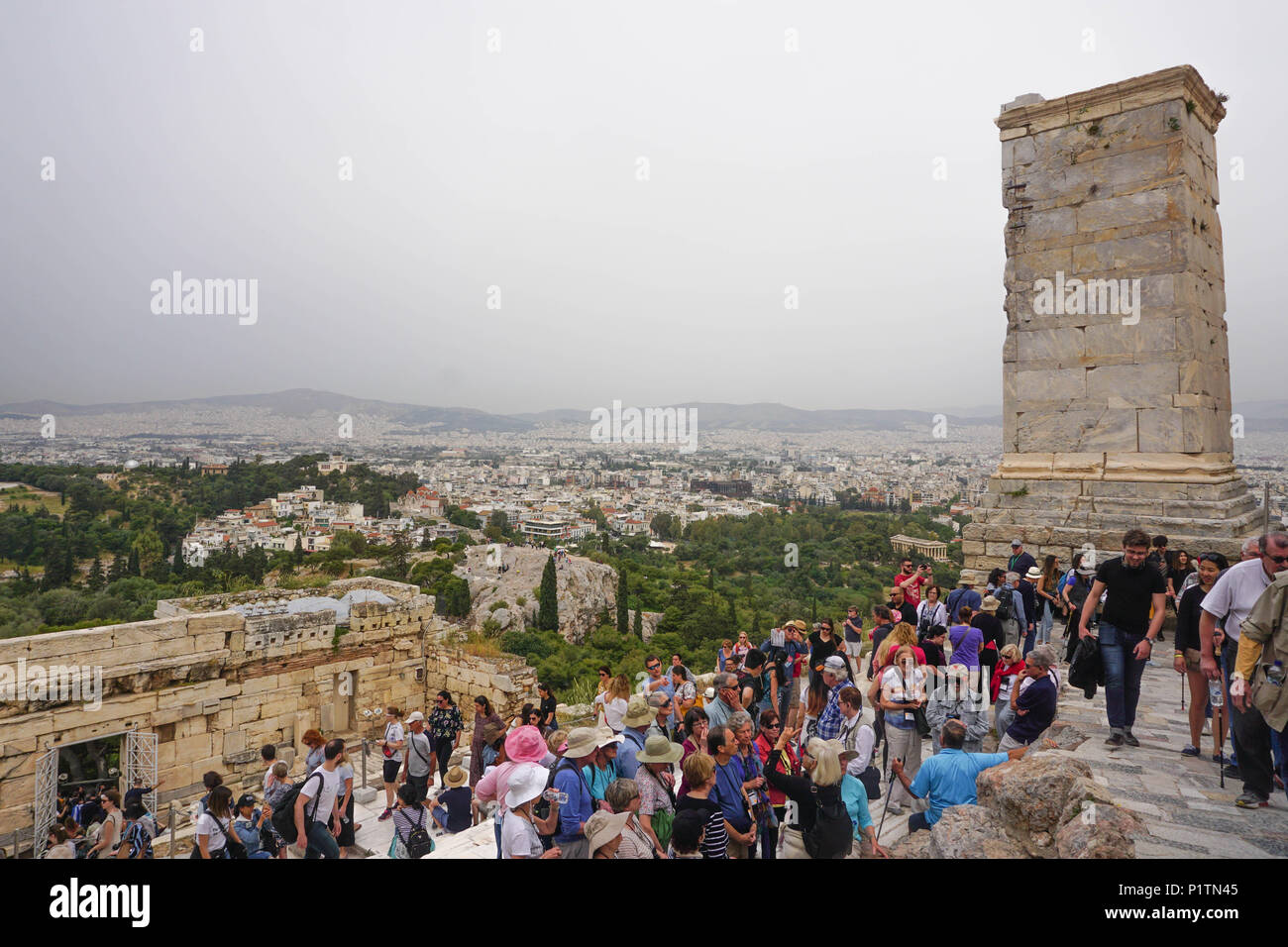 Athens, Greece - April 16, 2018: Tourists crowd the entrance of the ...