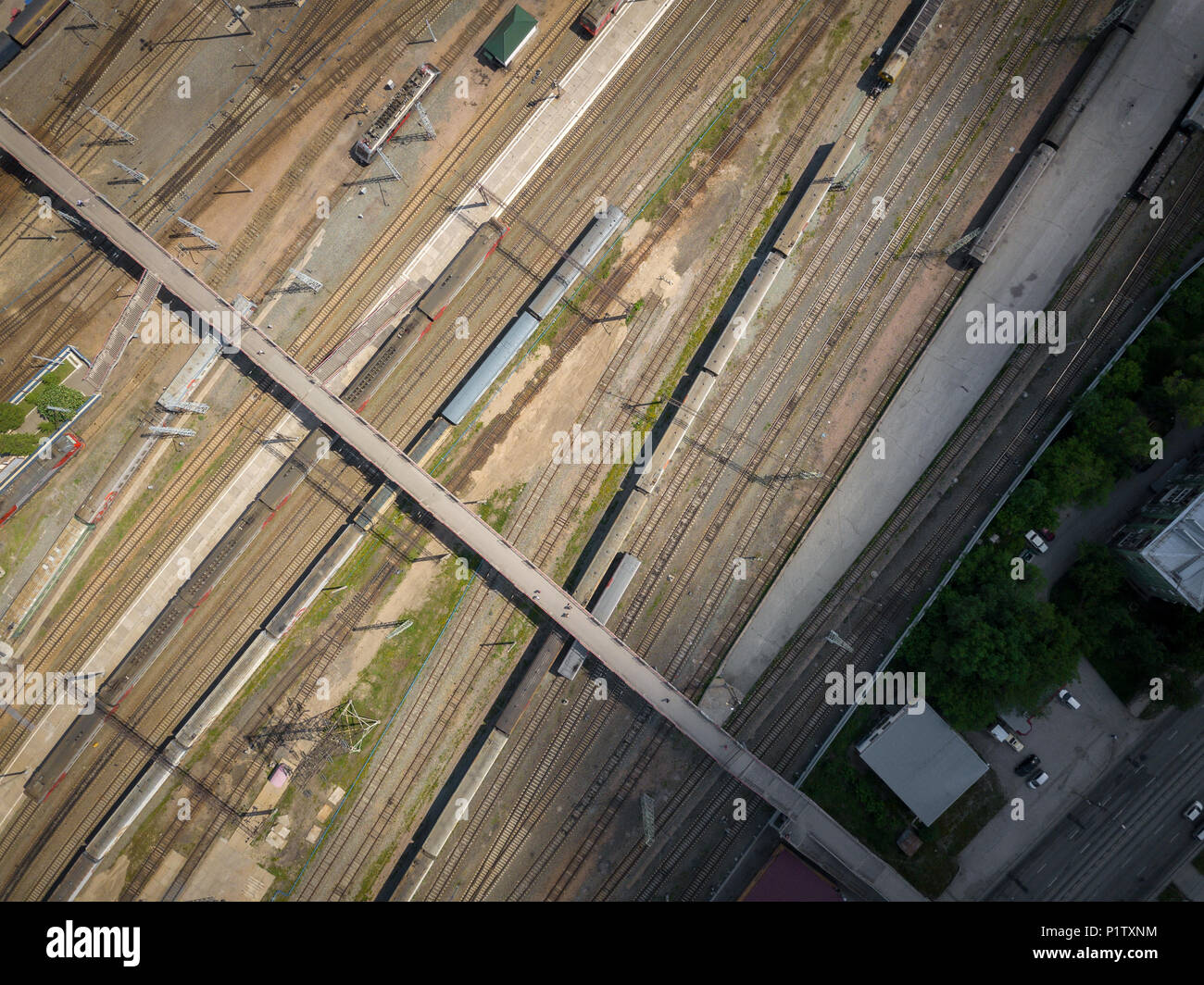 Aerial photography of a modern railway tracks, trains with wagons on ...