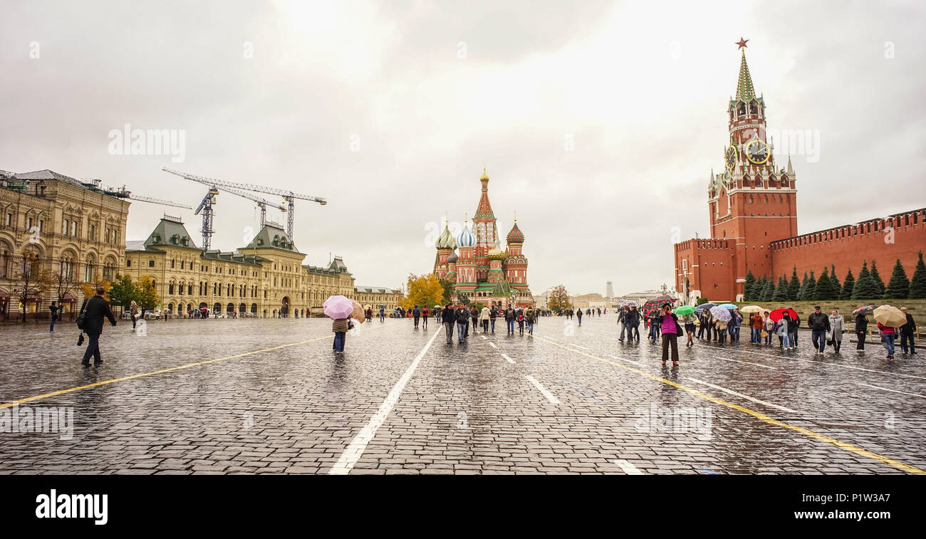 Moscow, Russia - Oct 4, 2016. People visit the Red Square in rainy day ...