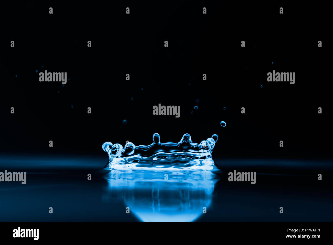 Photo of water splashes and ripples background Stock Photo - Alamy