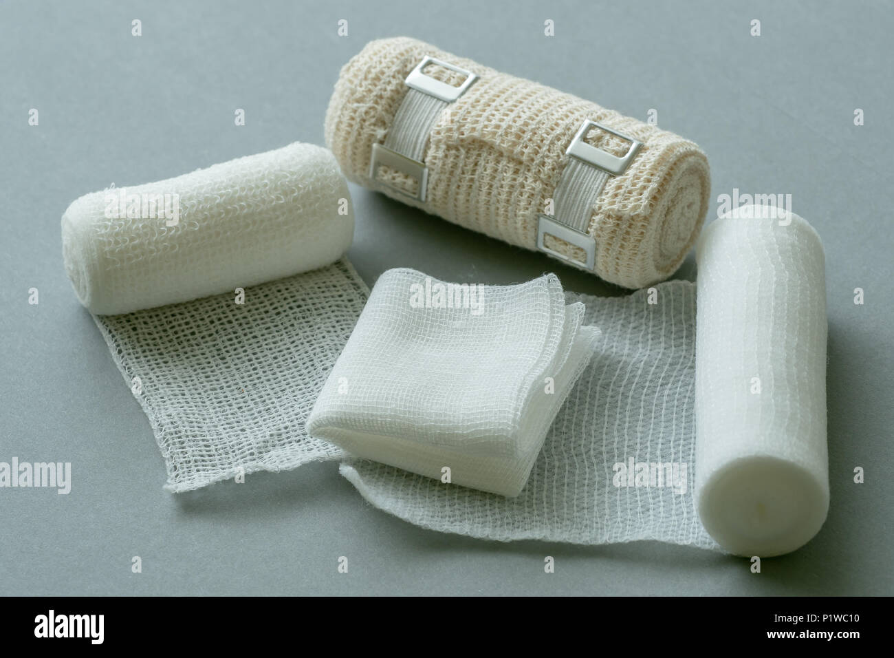 Medical bandages on gray background. Medical equipment Stock Photo - Alamy