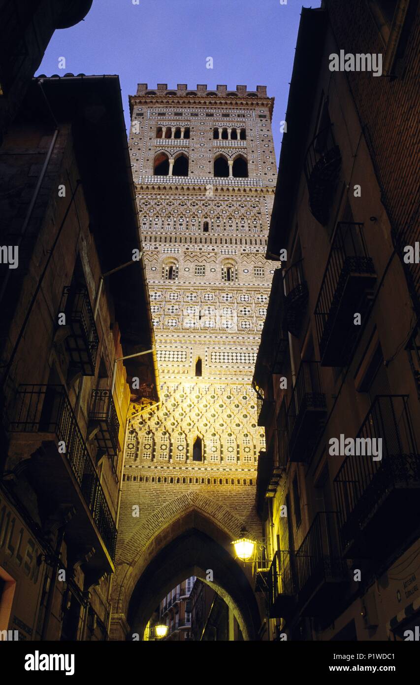 Tower of Salvador ("mudejar" architecture) and an old city street Stock ...
