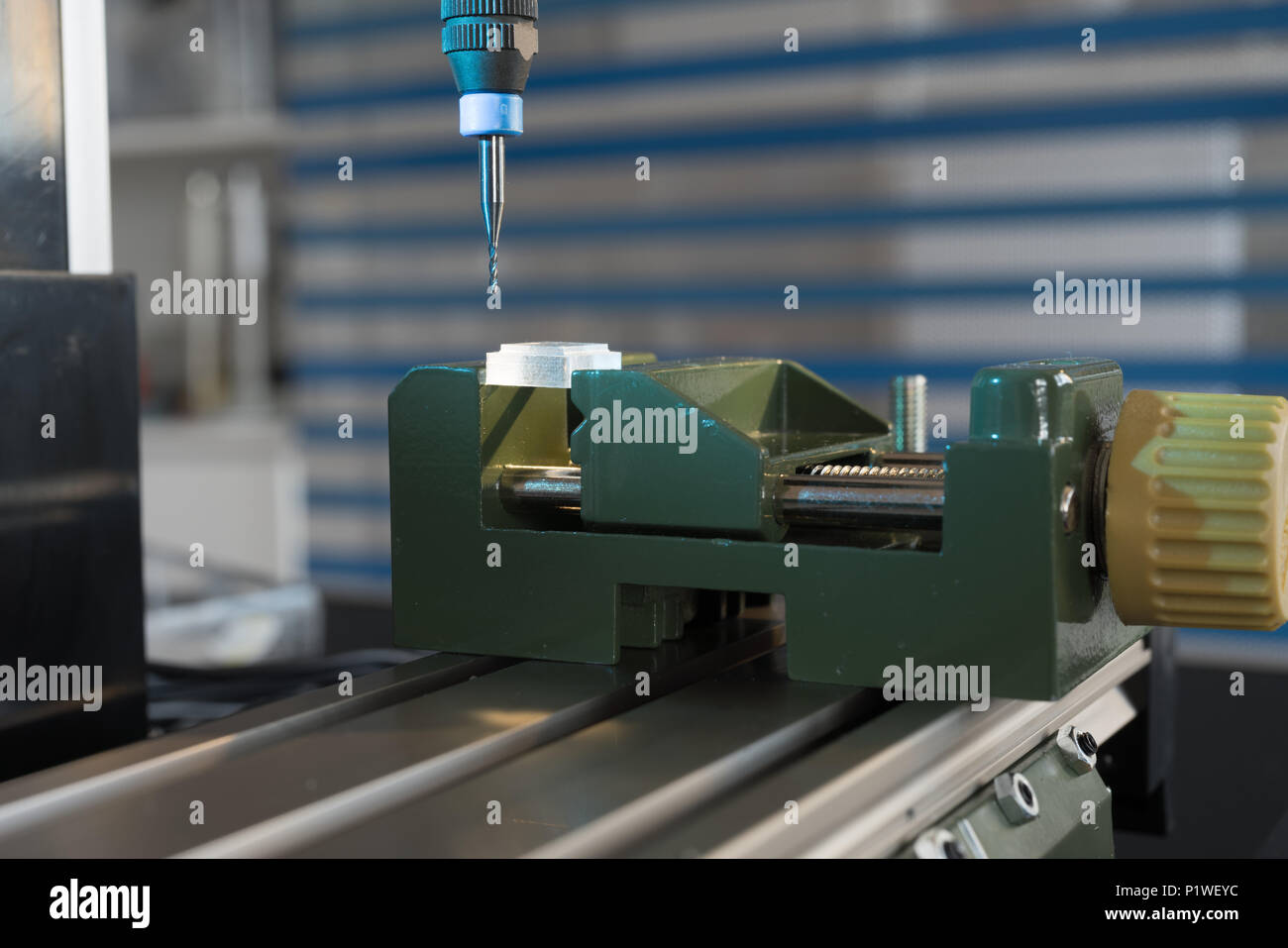 Processing of the plastic workpiece on CNC milling machine Stock Photo ...