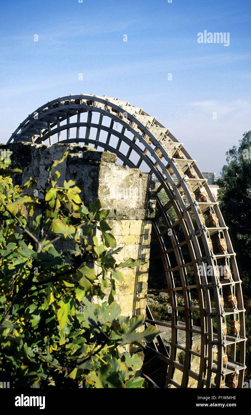 old arab waterwheel at the Guadalquivir river Stock Photo - Alamy