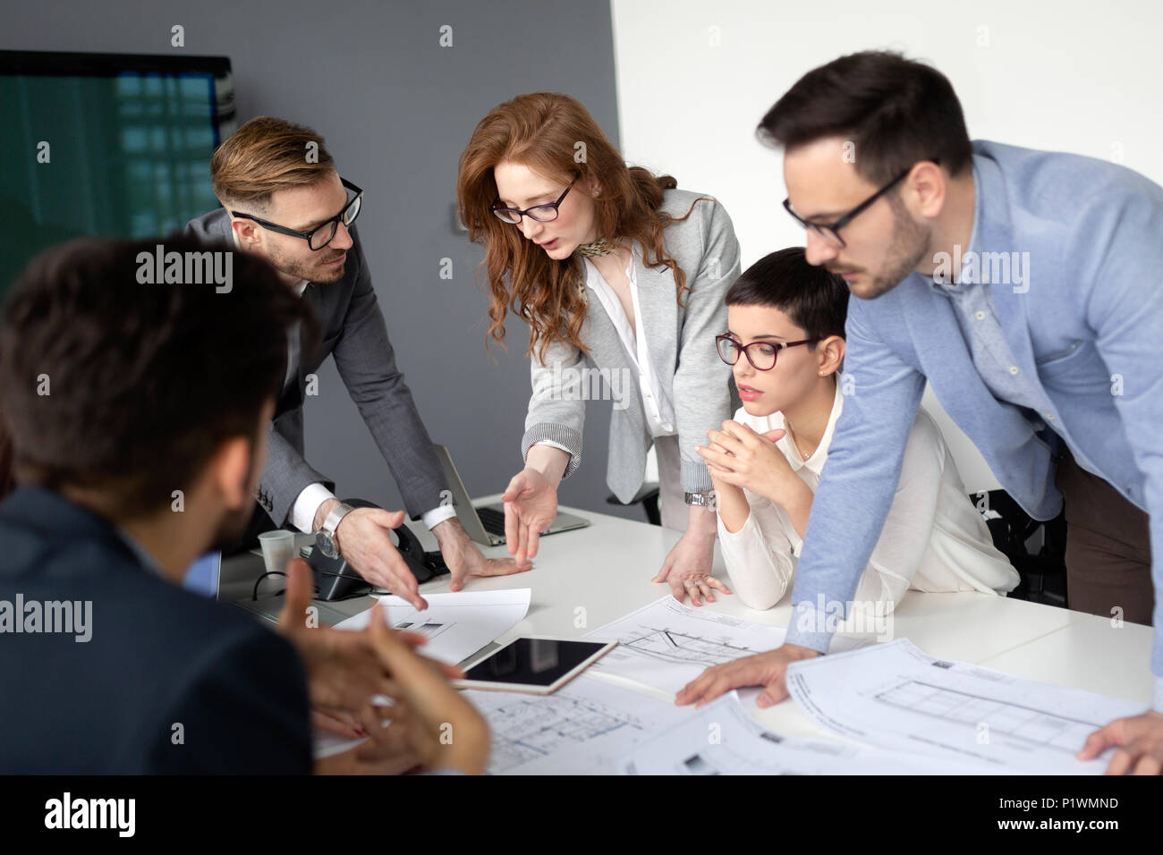 Corporate business team and manager in a meeting Stock Photo - Alamy