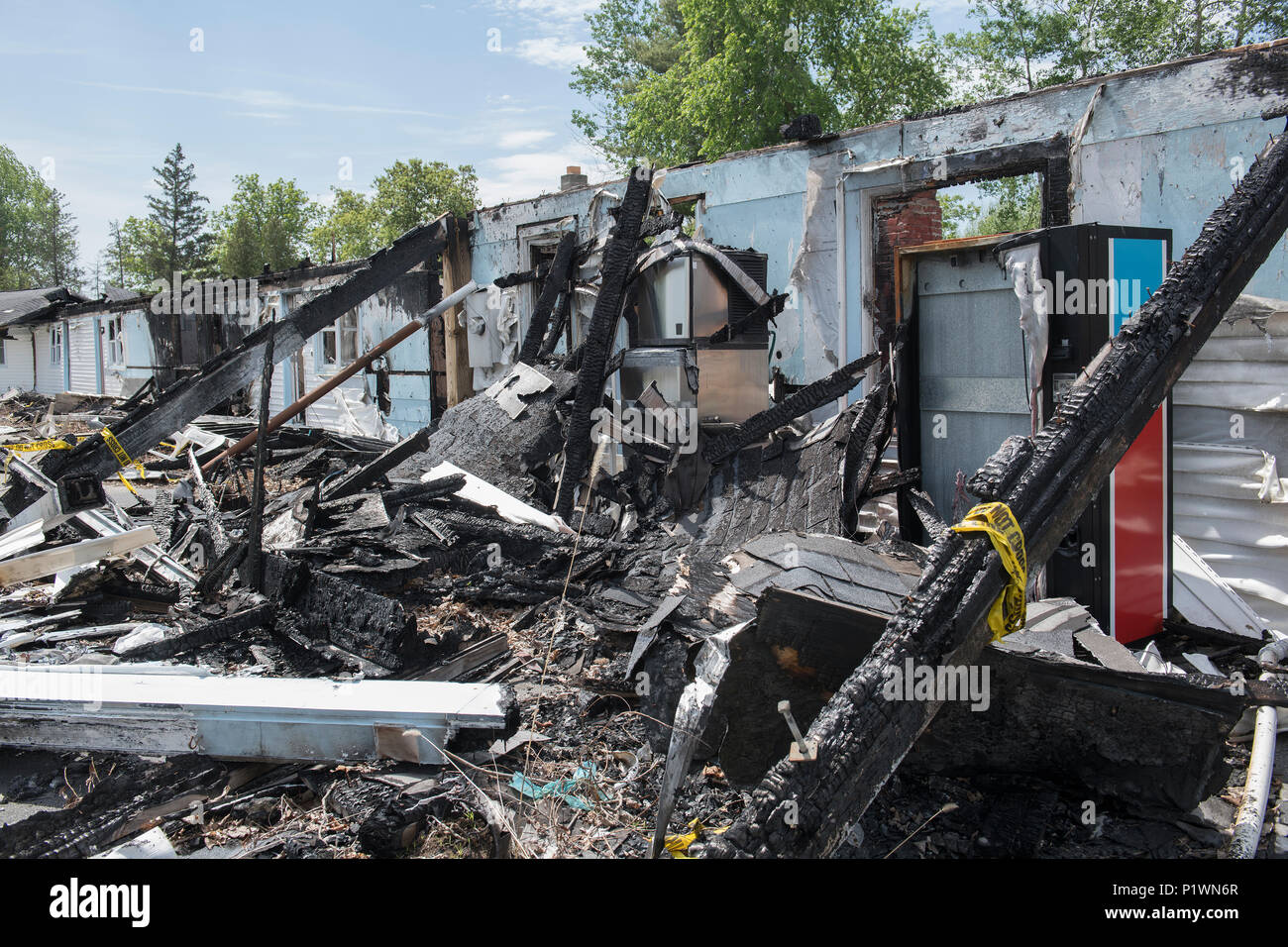 The charred remains of a motel burned down in a devestating fire Stock ...