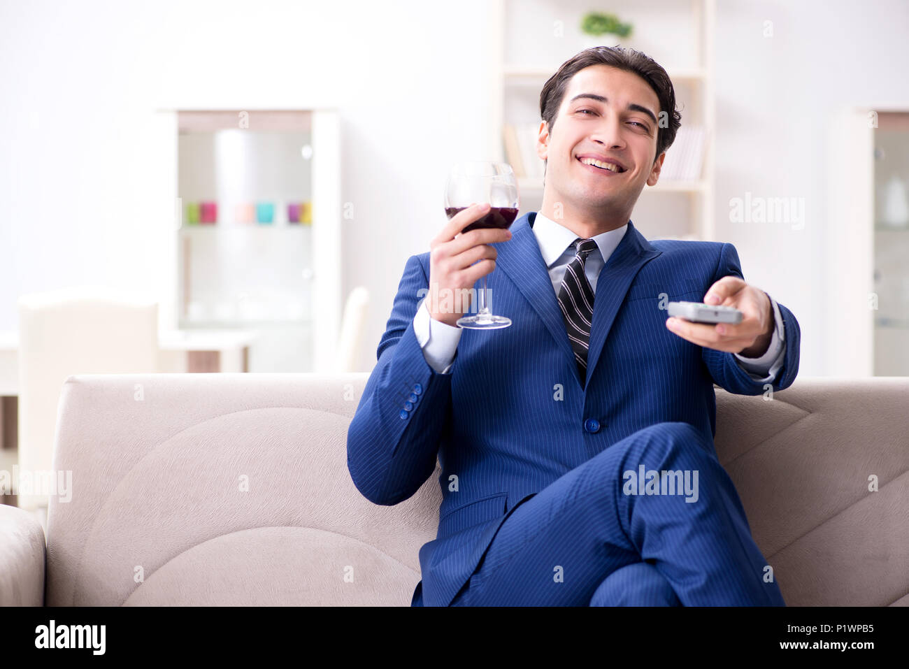 Changing channels businessman hi-res stock photography and images - Alamy