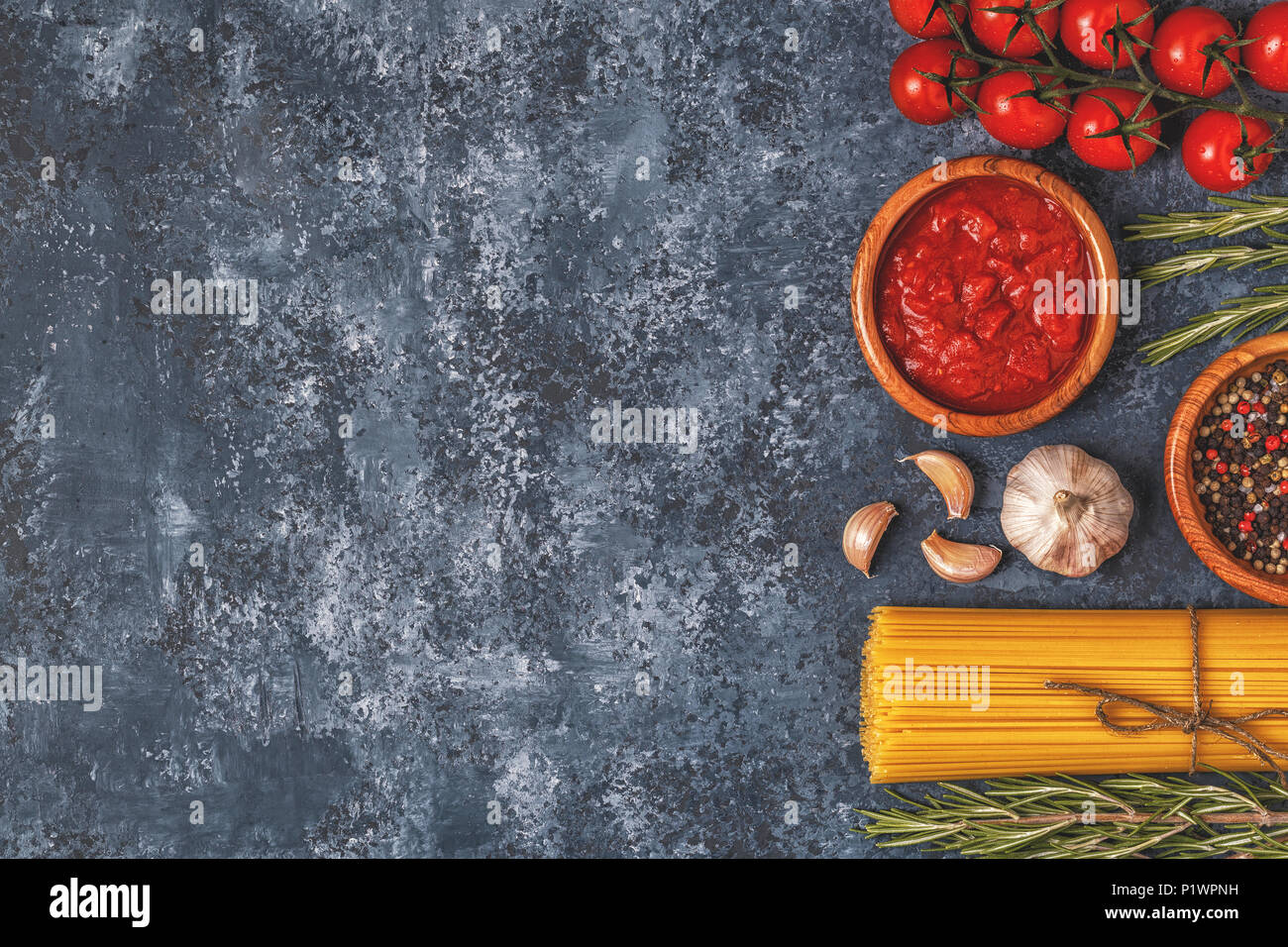 Italian food background with pasta, spices and vegetables. Top view ...