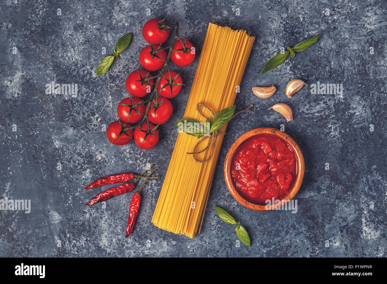 Italian food background with pasta, spices and vegetables. Top view ...