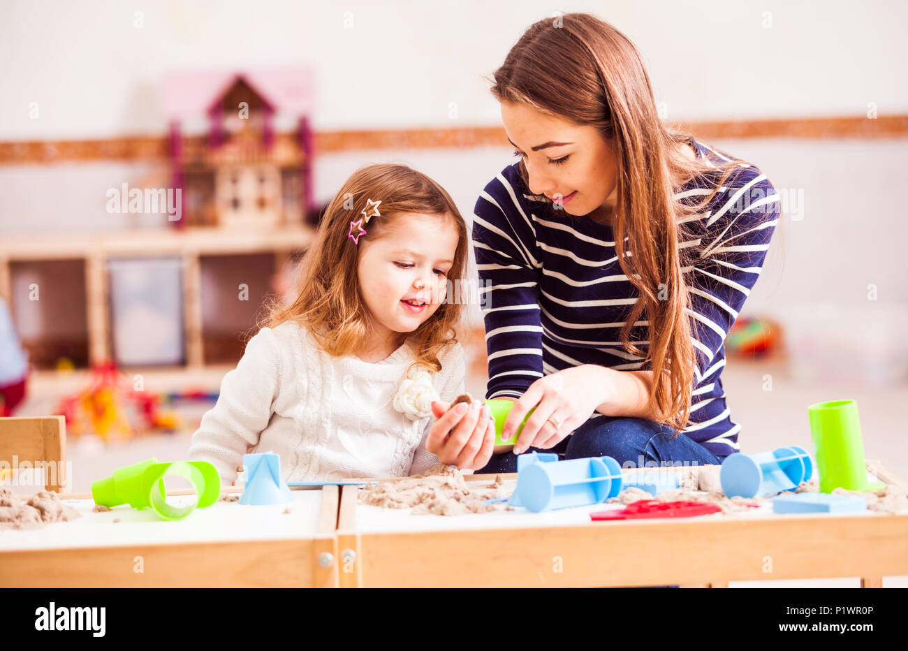 fun with making sand shapes Stock Photo - Alamy