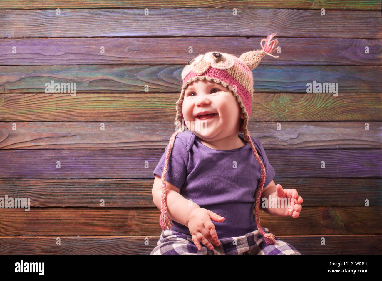 Little baby in a funny hat Stock Photo - Alamy