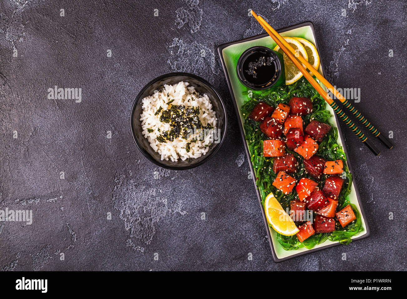 Poke, traditional Hawaiian raw fish salad, top view Stock Photo - Alamy