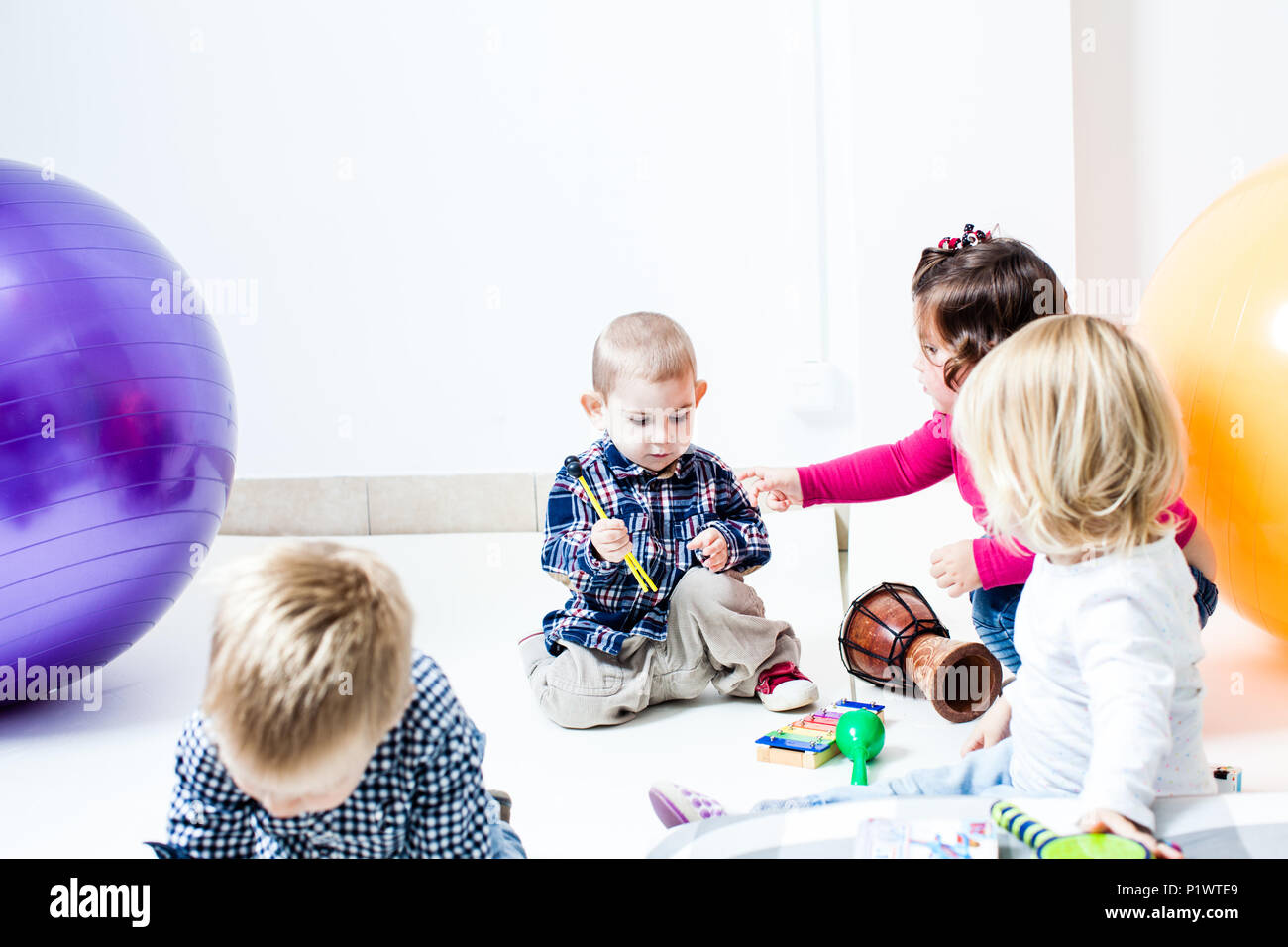 The children play musical instruments Stock Photo - Alamy
