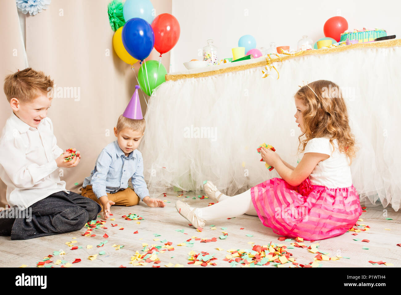 Celebrating birthday party with confetti Stock Photo - Alamy