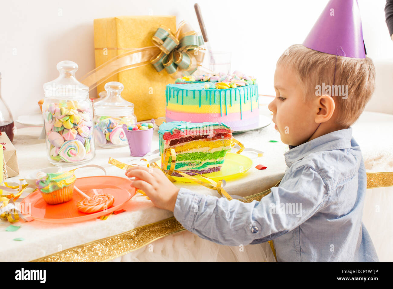 Boy with candies hi-res stock photography and images - Alamy