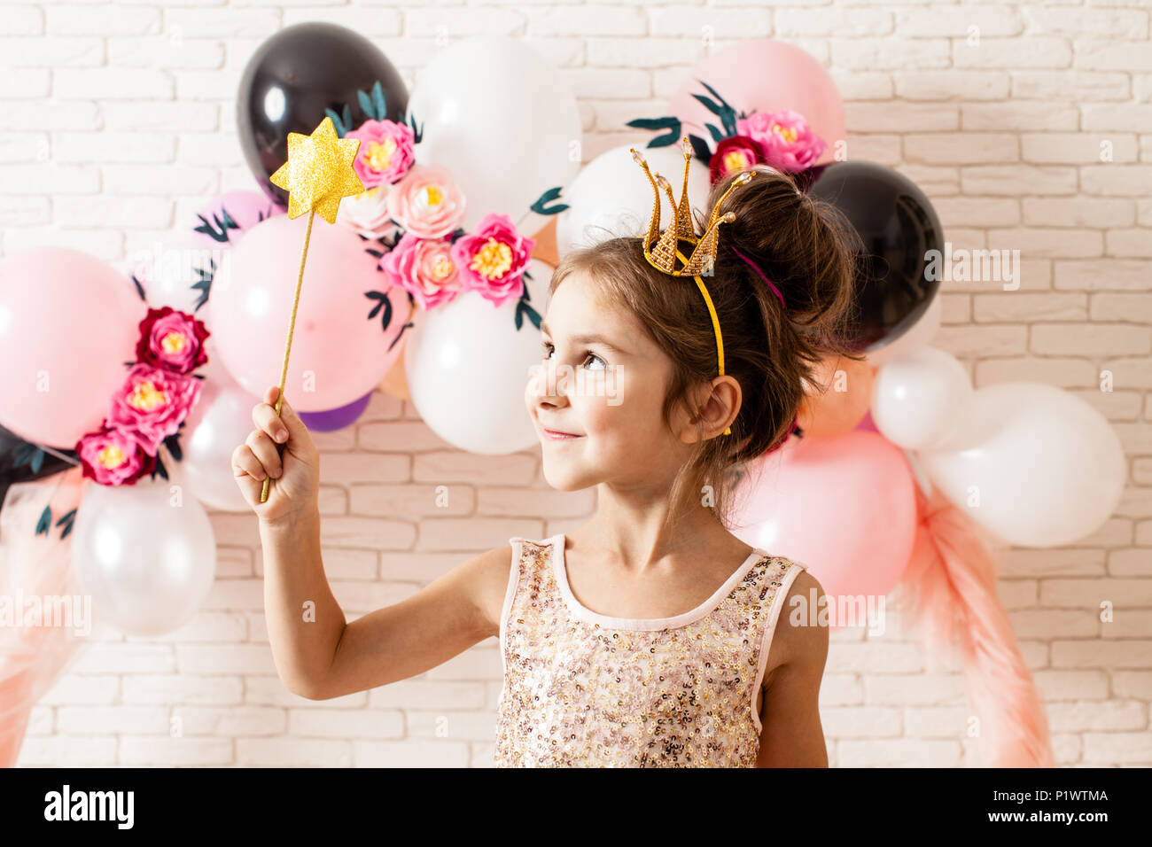 little princess wants to be a magician Stock Photo - Alamy