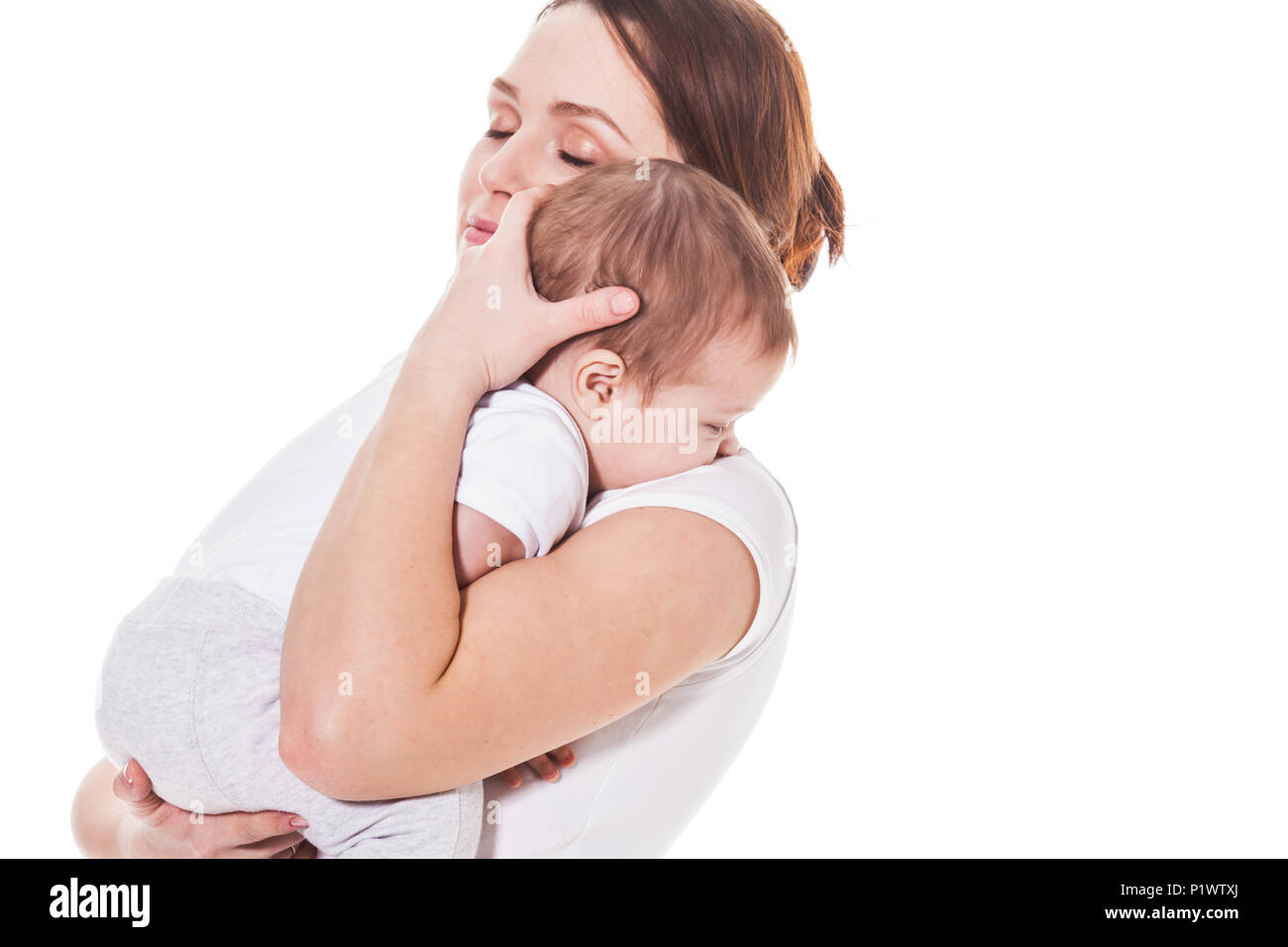Mother rock her baby Stock Photo - Alamy