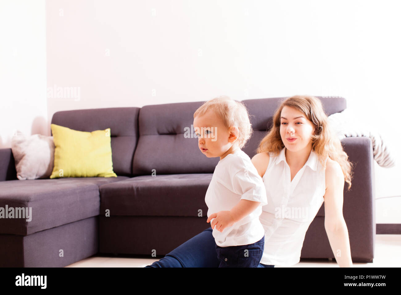concentrated baby is looking forward Stock Photo - Alamy