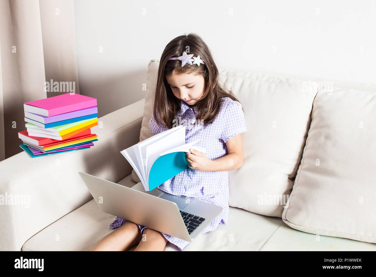 Smiling girl has an idea Stock Photo - Alamy