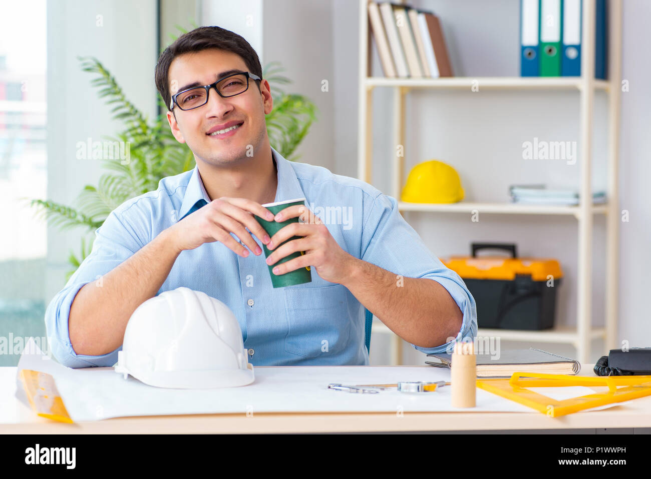 Construction engineer working on new project Stock Photo - Alamy