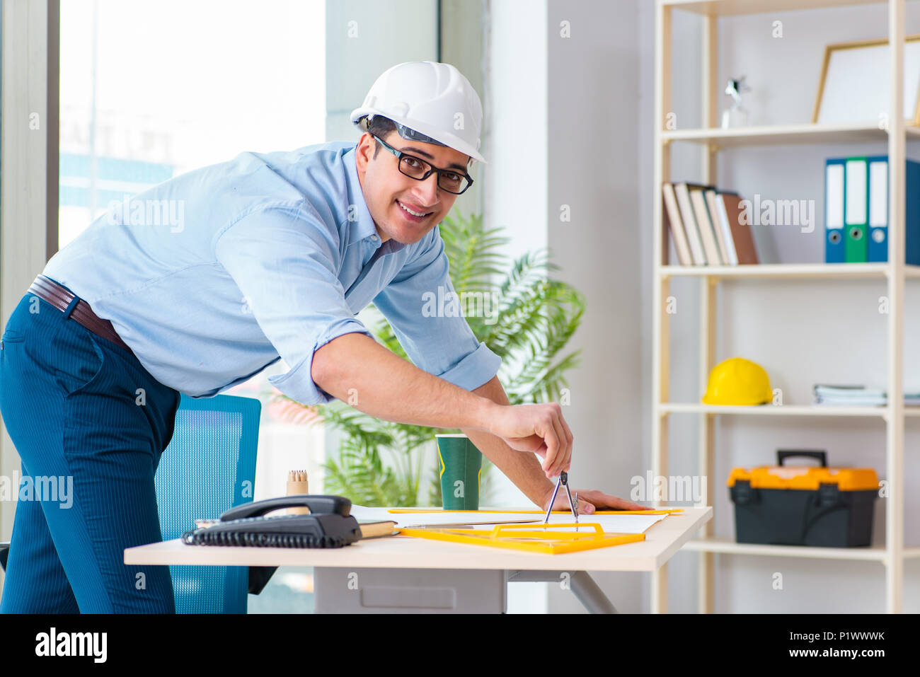 Construction engineer working on new project Stock Photo - Alamy
