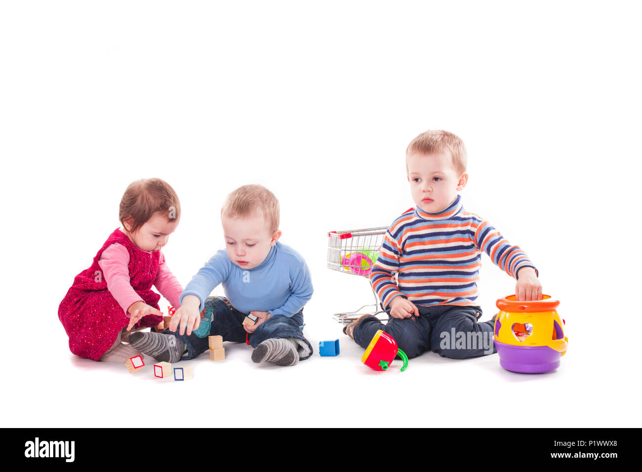 Three children play Stock Photo - Alamy