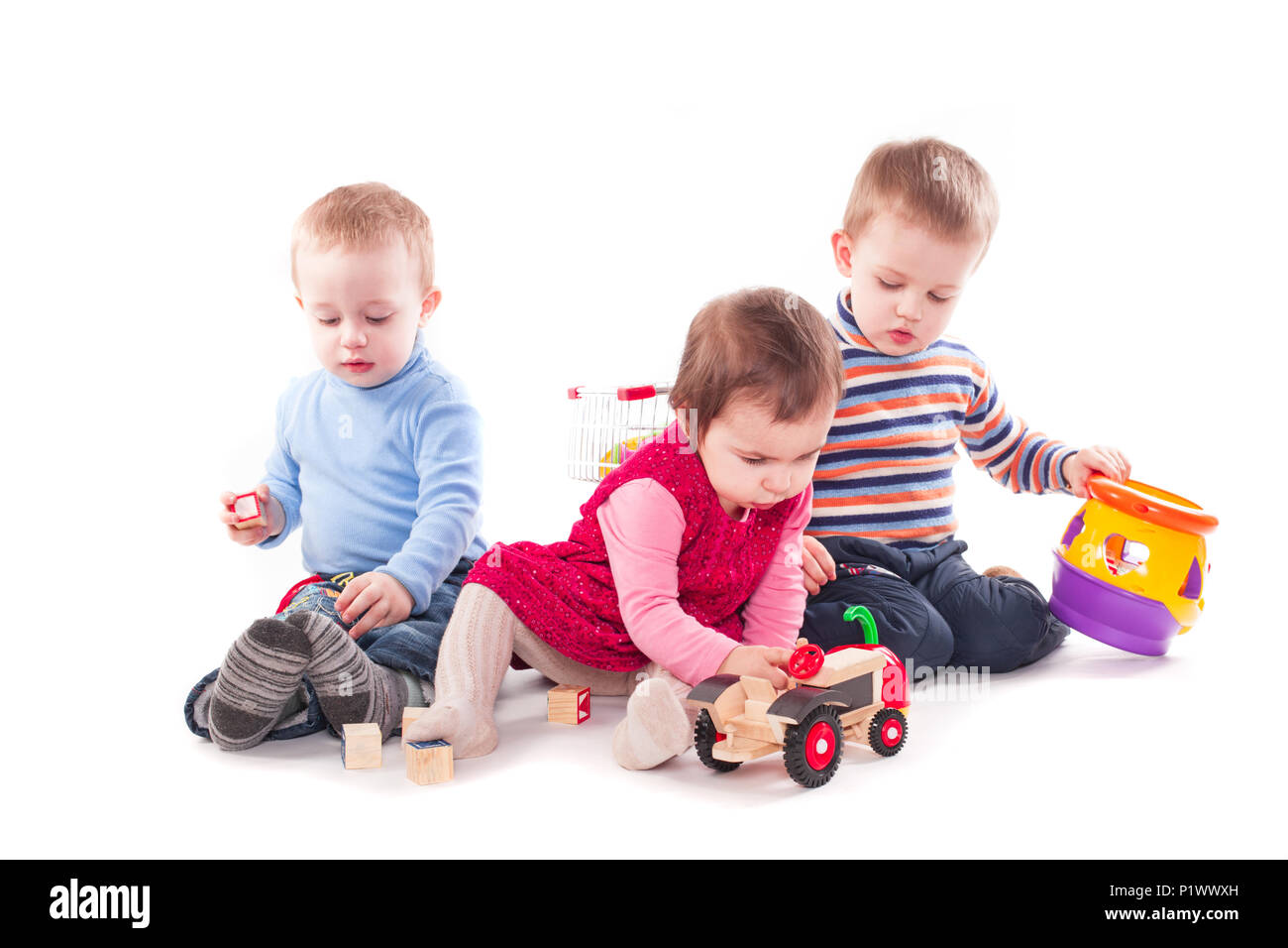 Three children play Stock Photo - Alamy