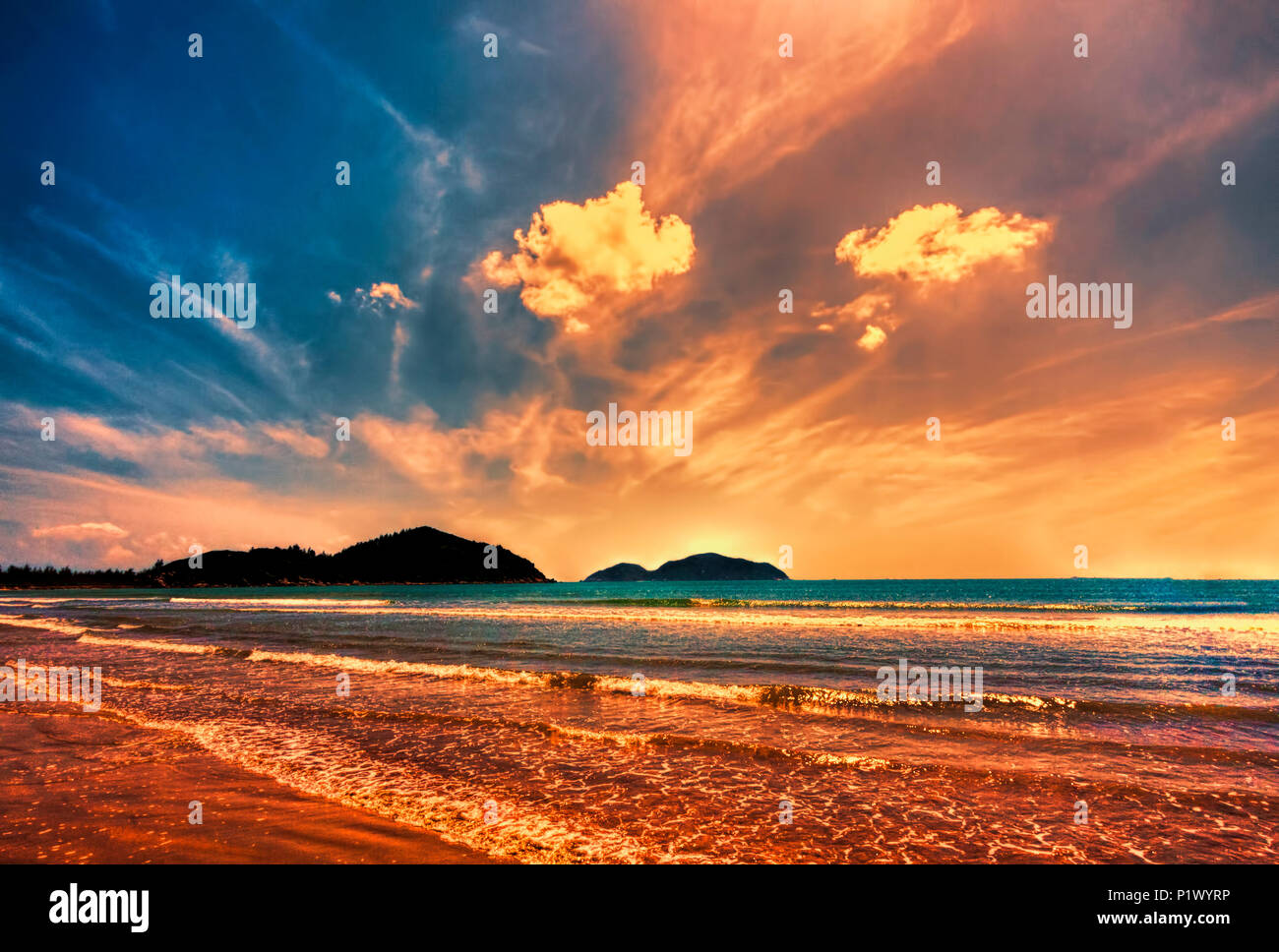 Tropical sunset on the beach of Hainan Island - China Stock Photo - Alamy