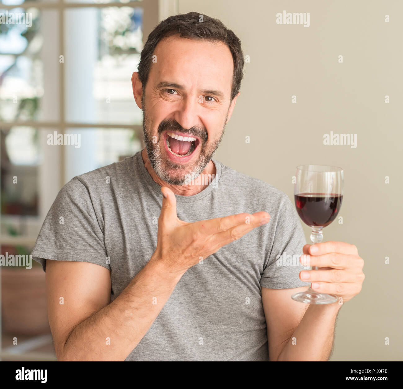 Man middle age drinking alcohol drunk hi-res stock photography and ...
