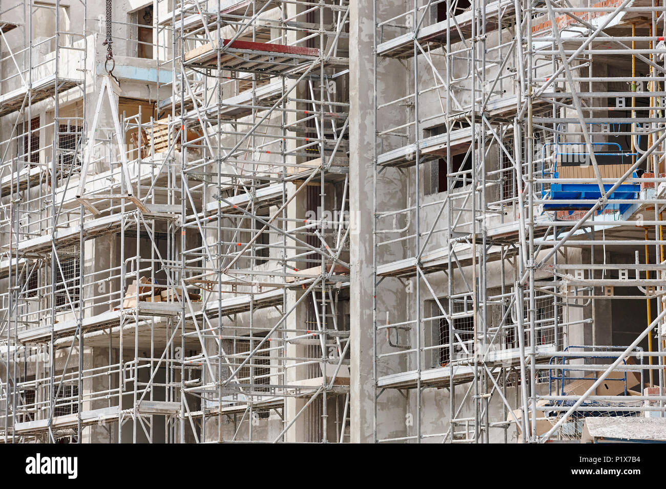 Scaffolding structure on a building. Construction architecture industry ...