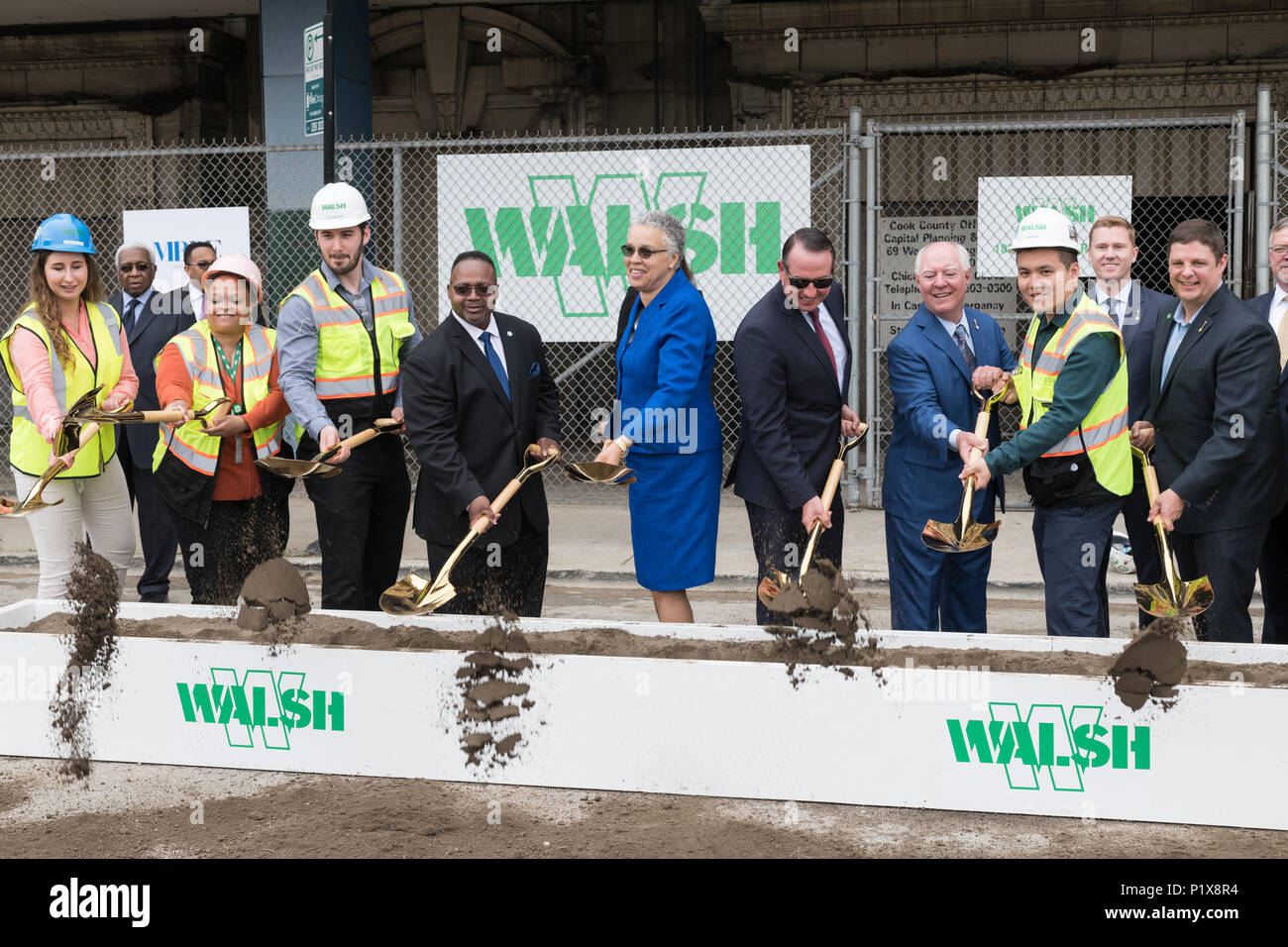 Attendees at the groundbreaking ceremony for the redevelopment of Cook ...