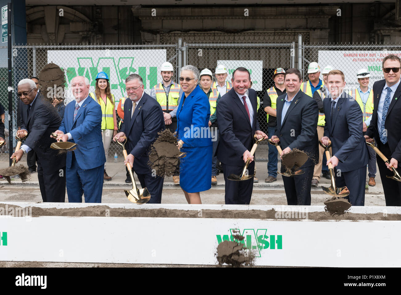 Attendees at the groundbreaking ceremony for the redevelopment of Cook ...