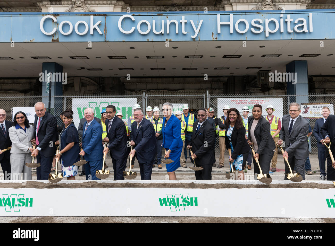 Attendees at the groundbreaking ceremony for the redevelopment of Cook ...