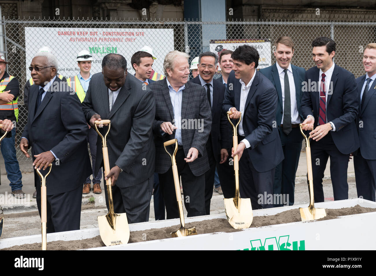 Attendees at the groundbreaking ceremony for the redevelopment of Cook ...