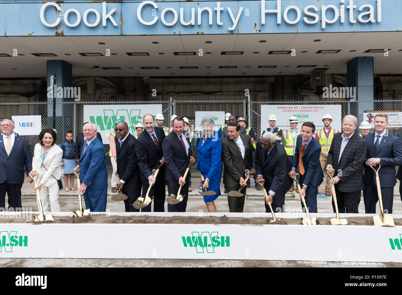 Attendees at the groundbreaking ceremony for the redevelopment of Cook ...